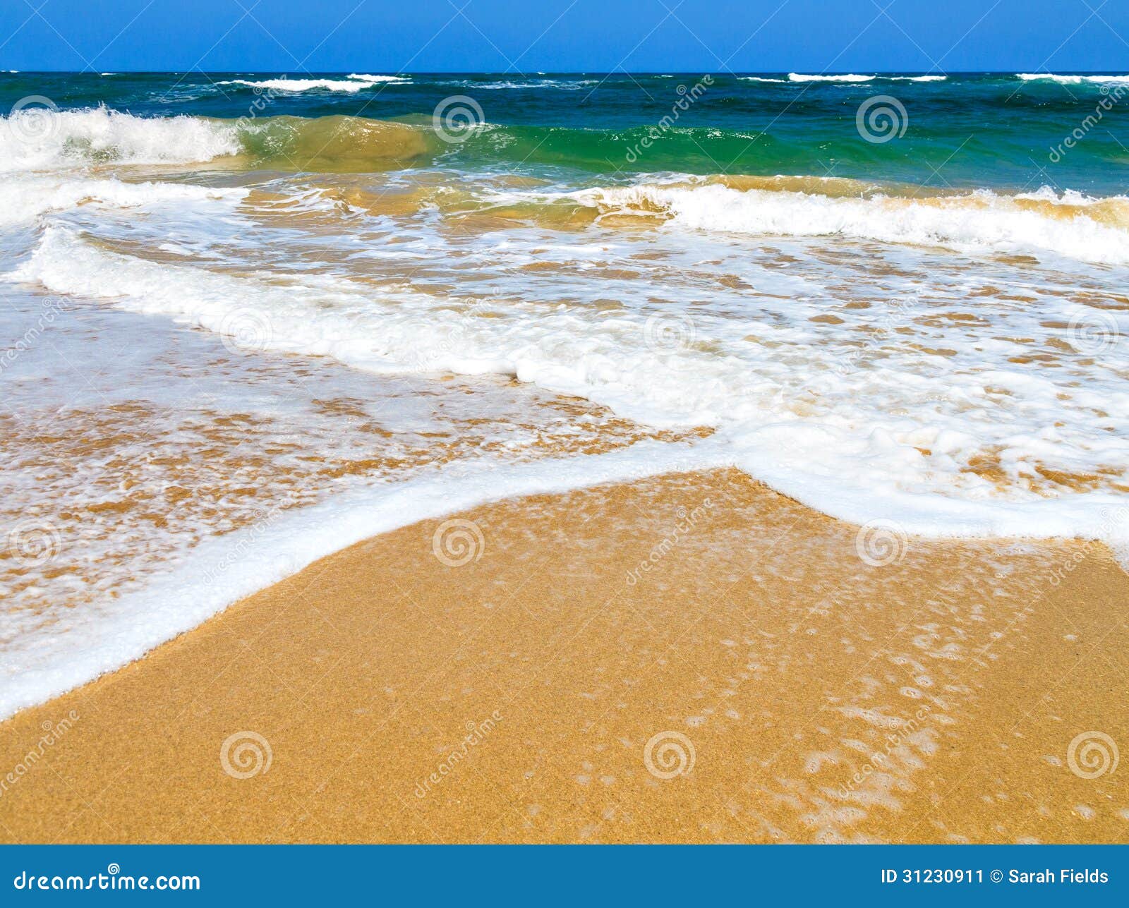Waves crashing on a beach stock image. Image of island - 31230911