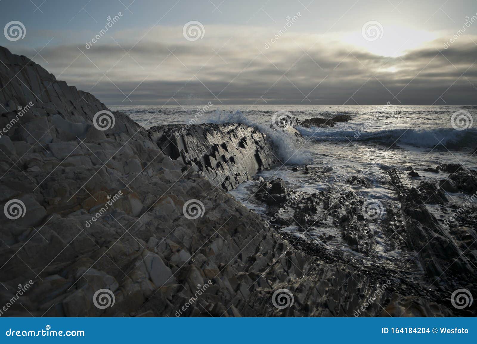 Waves Crashing on Jagged Rocks Stock Photo - Image of nature, water ...