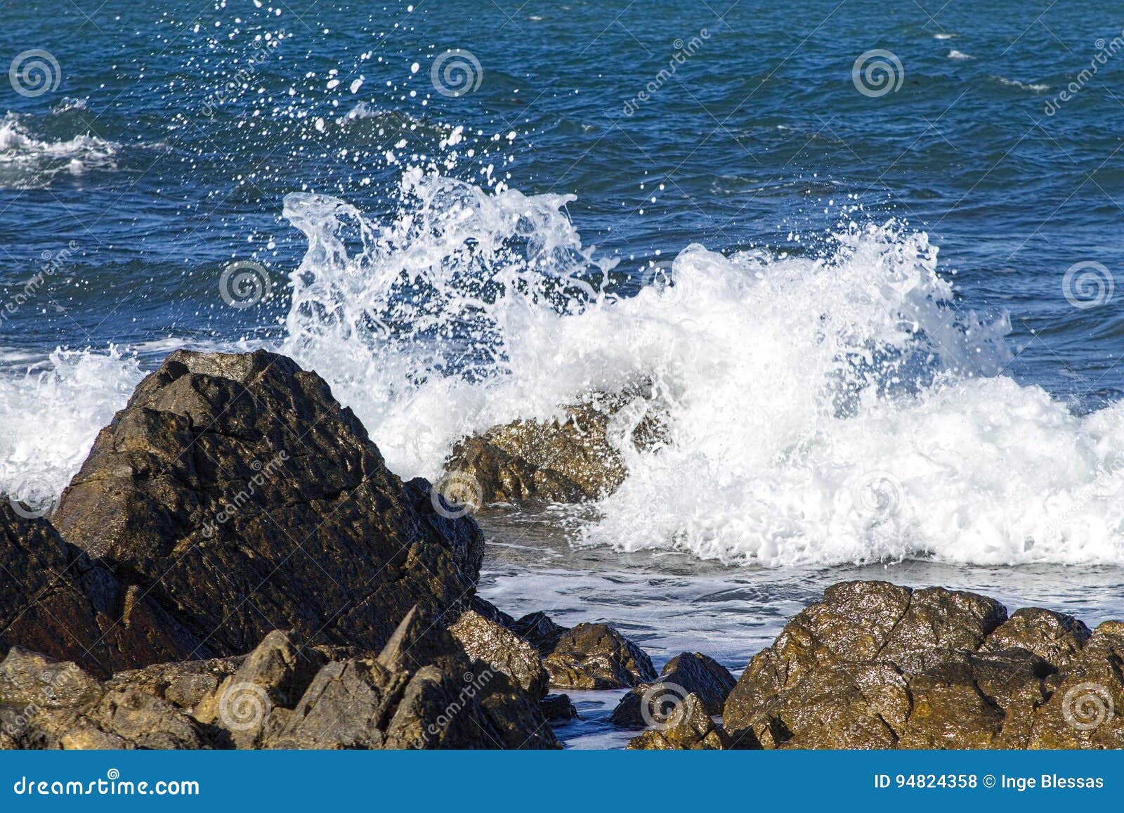 Waves crashing on rocks stock photo. Image of natural - 94824358