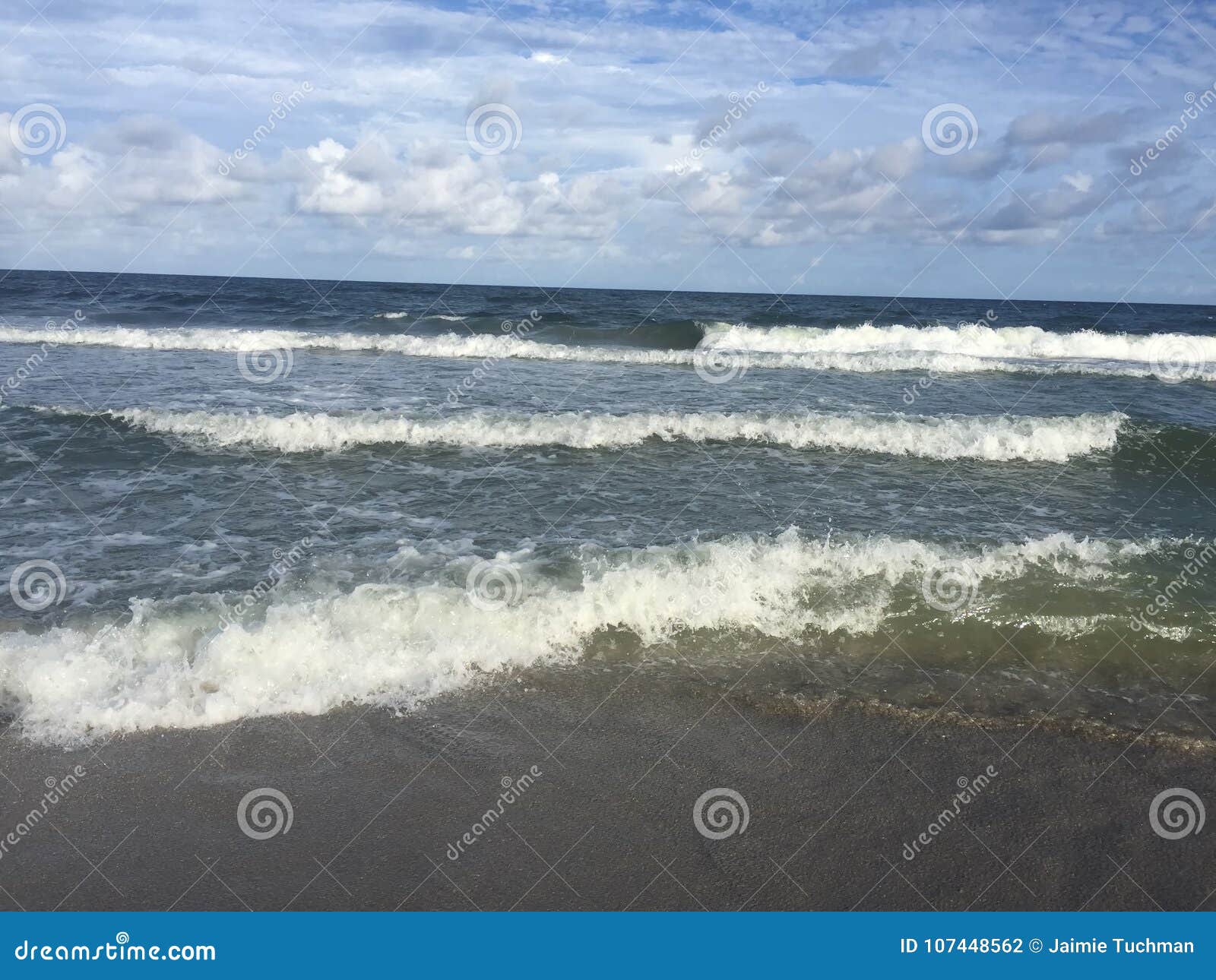 Waves crashing on the sand stock photo. Image of freshness - 107448562