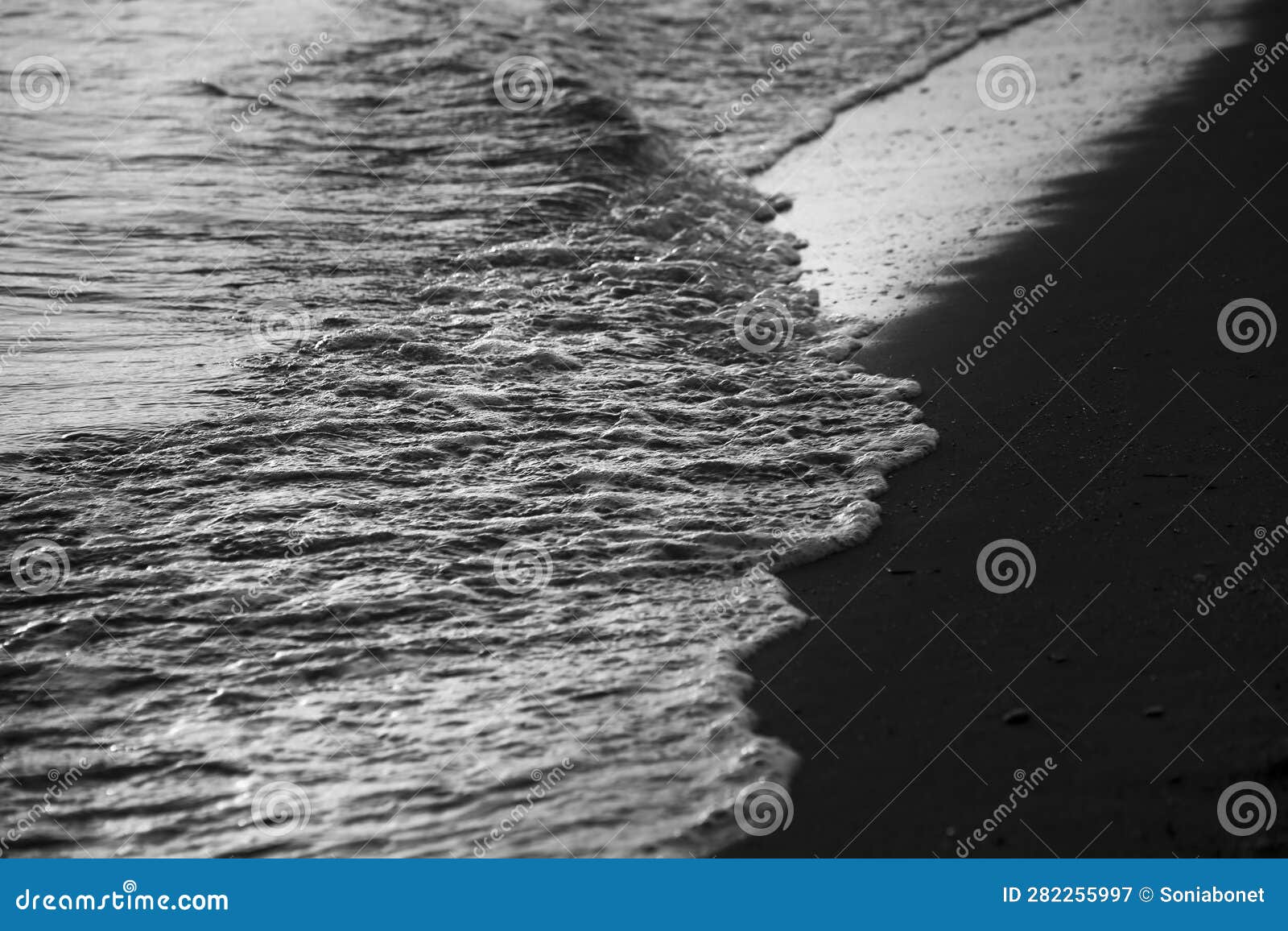 Waves Drawing Geometric Shapes on the Shore Stock Image - Image of ...