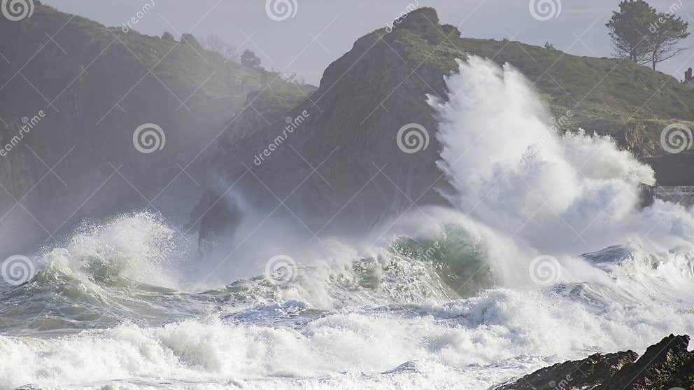The waves hit the cliff stock photo. Image of cliff - 296737724