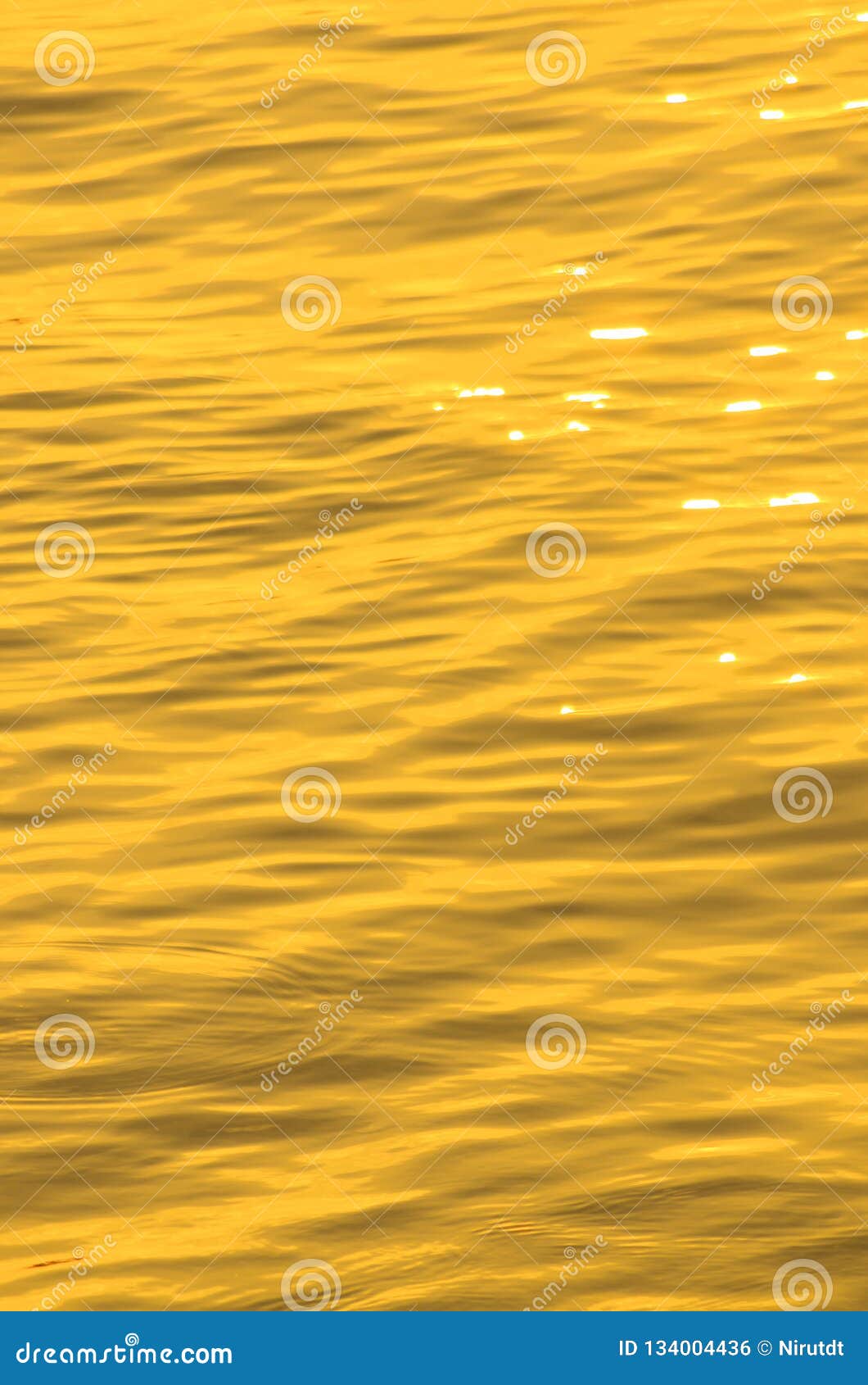 Waves of golden water stock photo. Image of wallpaper - 134004436