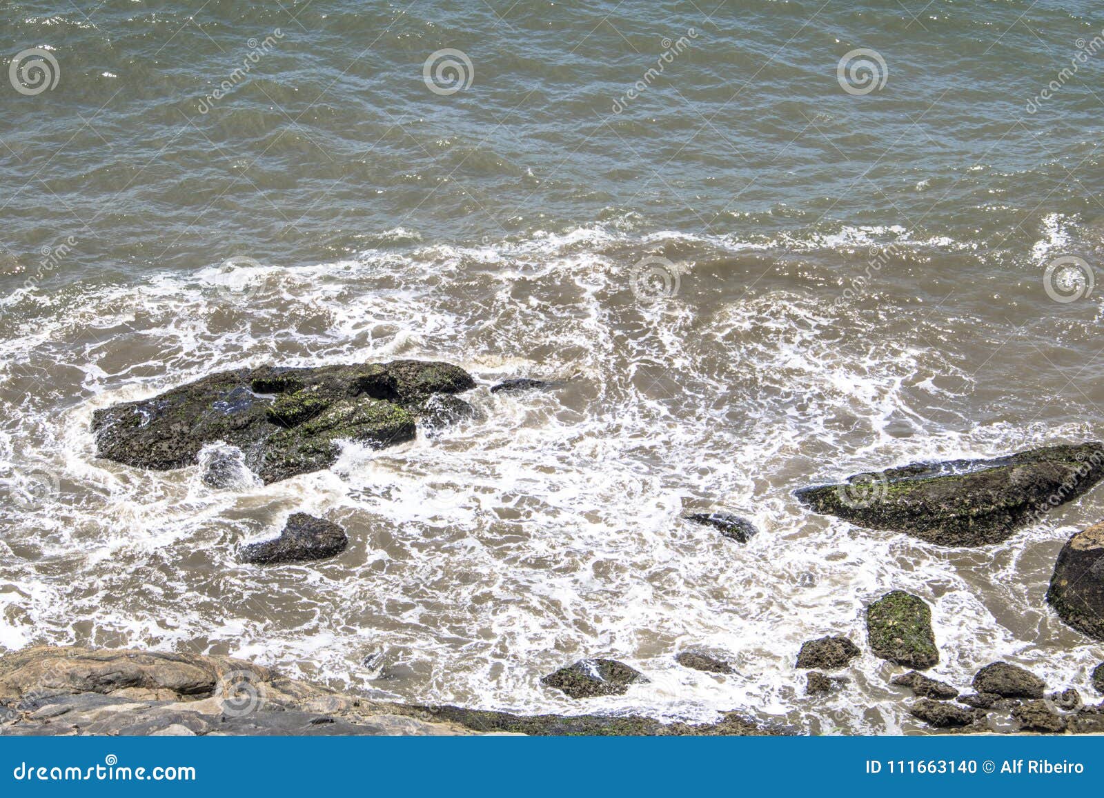Waves hit the rocks stock photo. Image of rippled, extreme - 111663140
