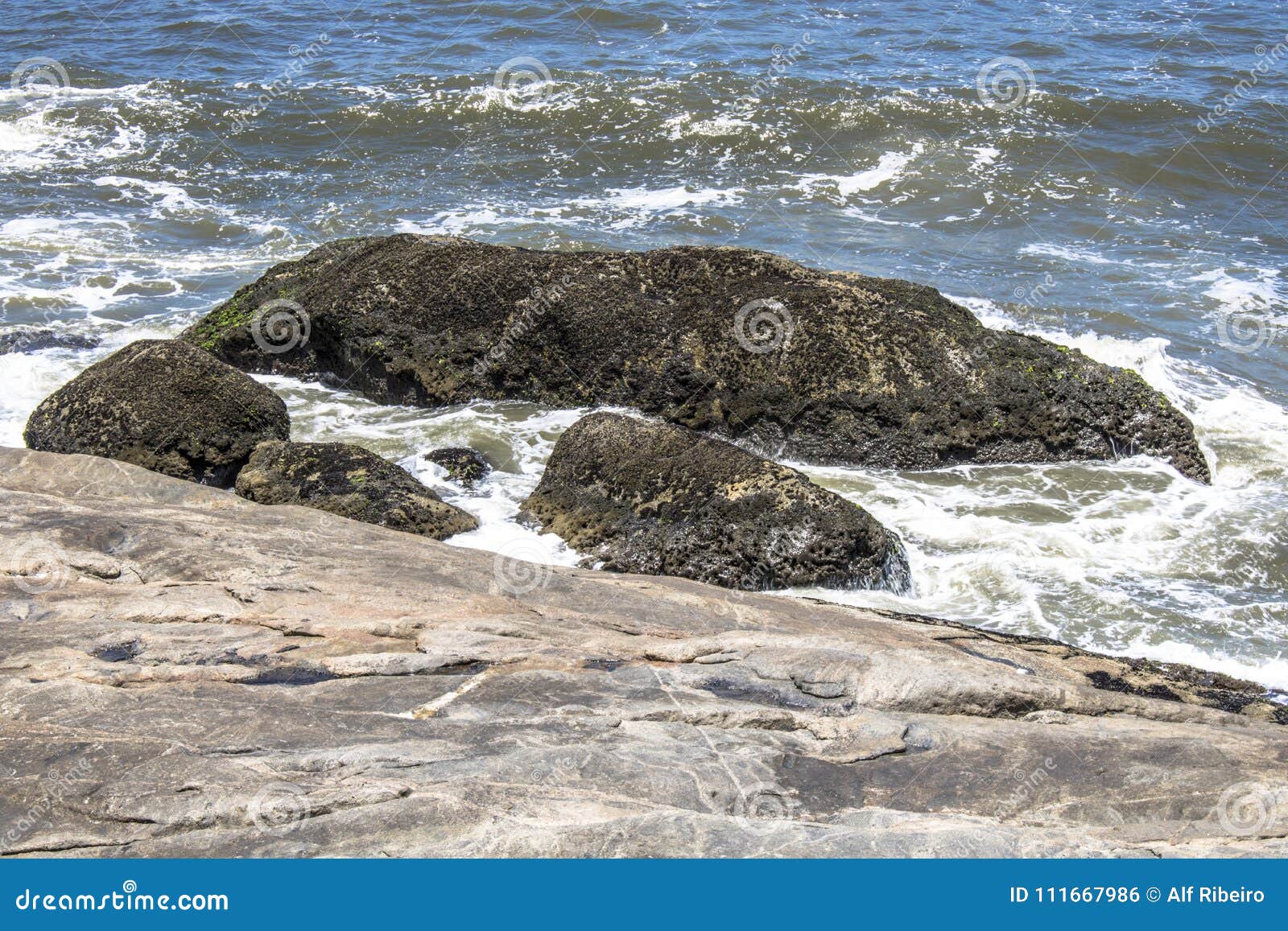 Waves hit the rocks stock photo. Image of spraying, seascape - 111667986