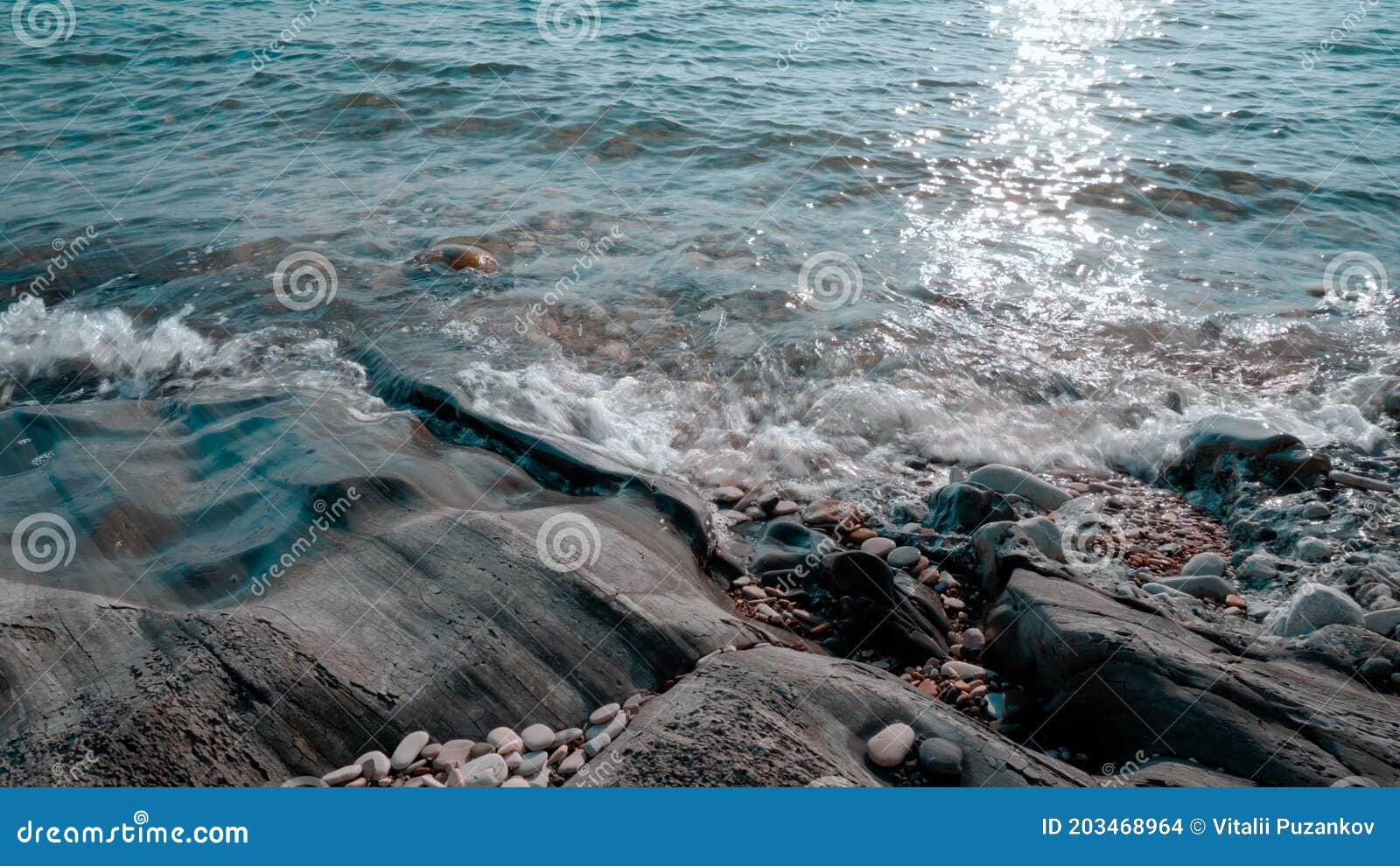 The Waves Hit the Rocks in Close-up. High Tide at Sea Stock Photo ...