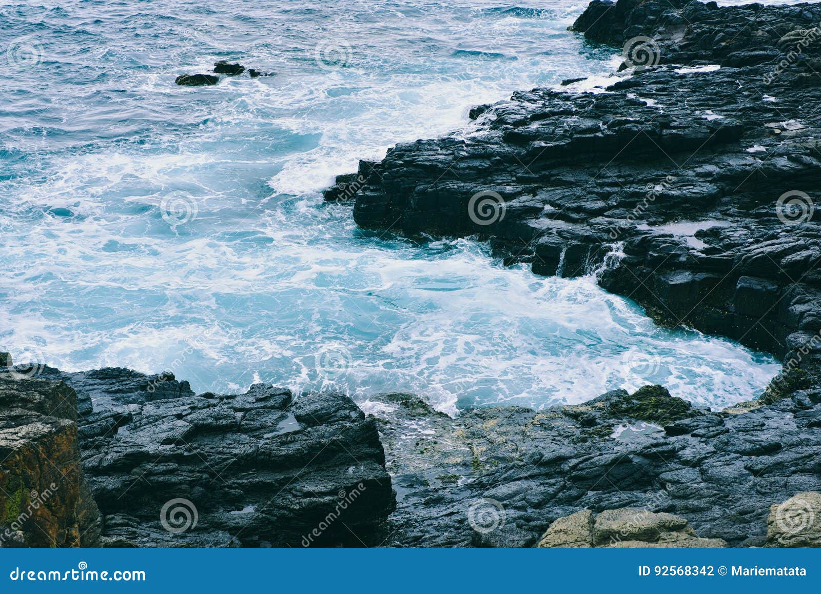 Waves hit the rocks stock photo. Image of ocean, hitting - 92568342