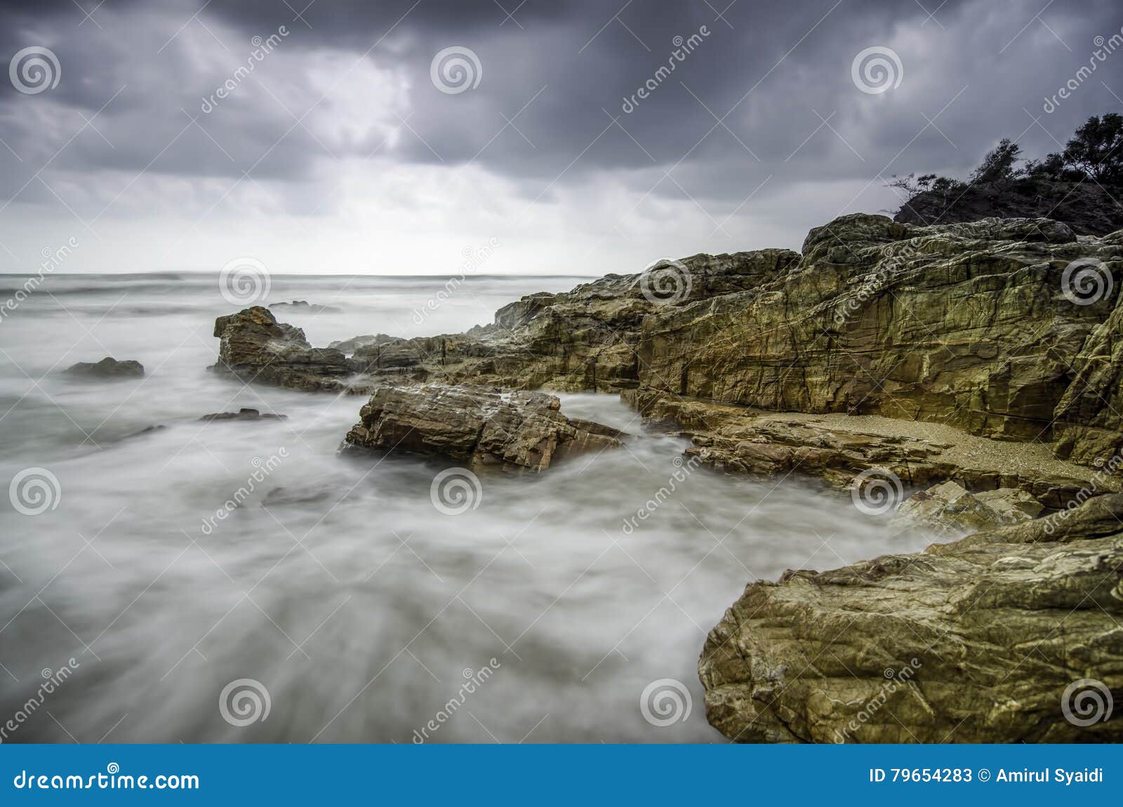 Waves Hitting the Rock at the Seashore. Soft Look Wave and Dramatic ...