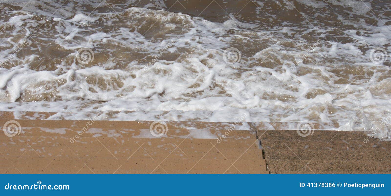 Waves lapping over steps stock photo. Image of water - 41378386