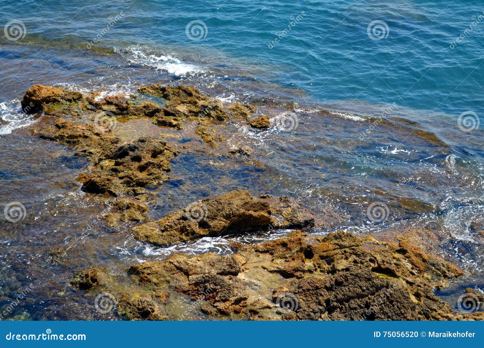 Waves in Ocean Break at Rocky Beach Stock Photo - Image of seashore ...