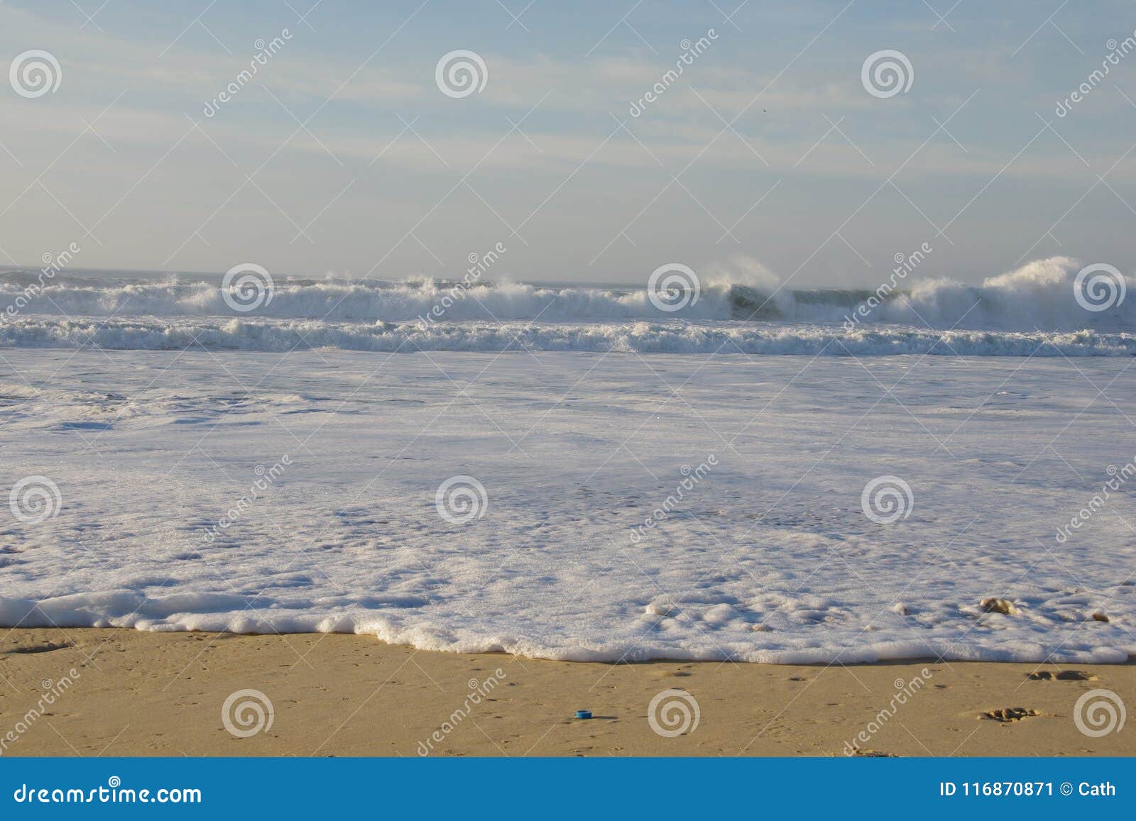The Waves of the Ocean Breaking on the Beach. Stock Image - Image of ...