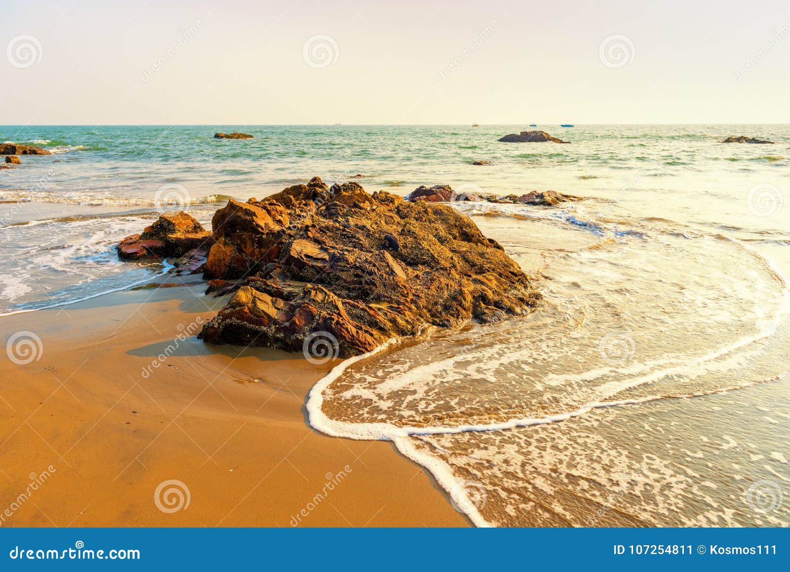 Waves in the Ocean and Rocks in the Water. Stock Image - Image of sand ...