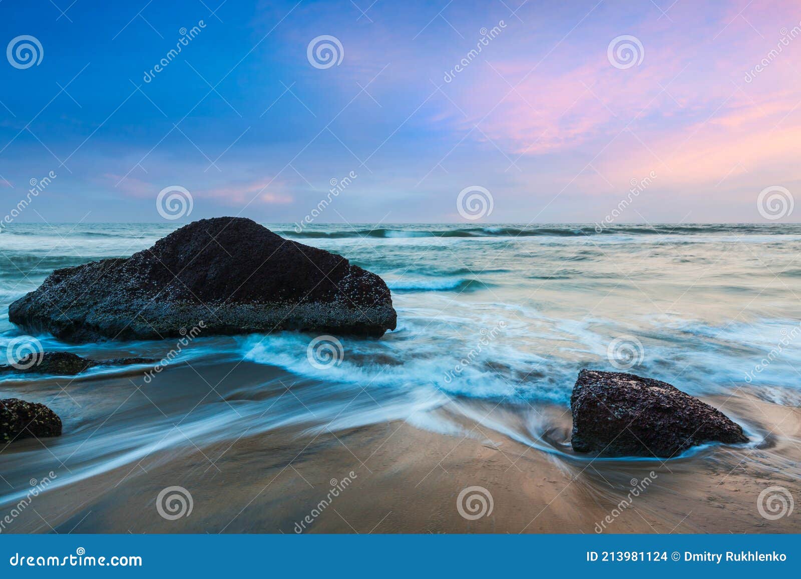 Waves and Rocks on Beach of Sunset Stock Photo - Image of landscape ...