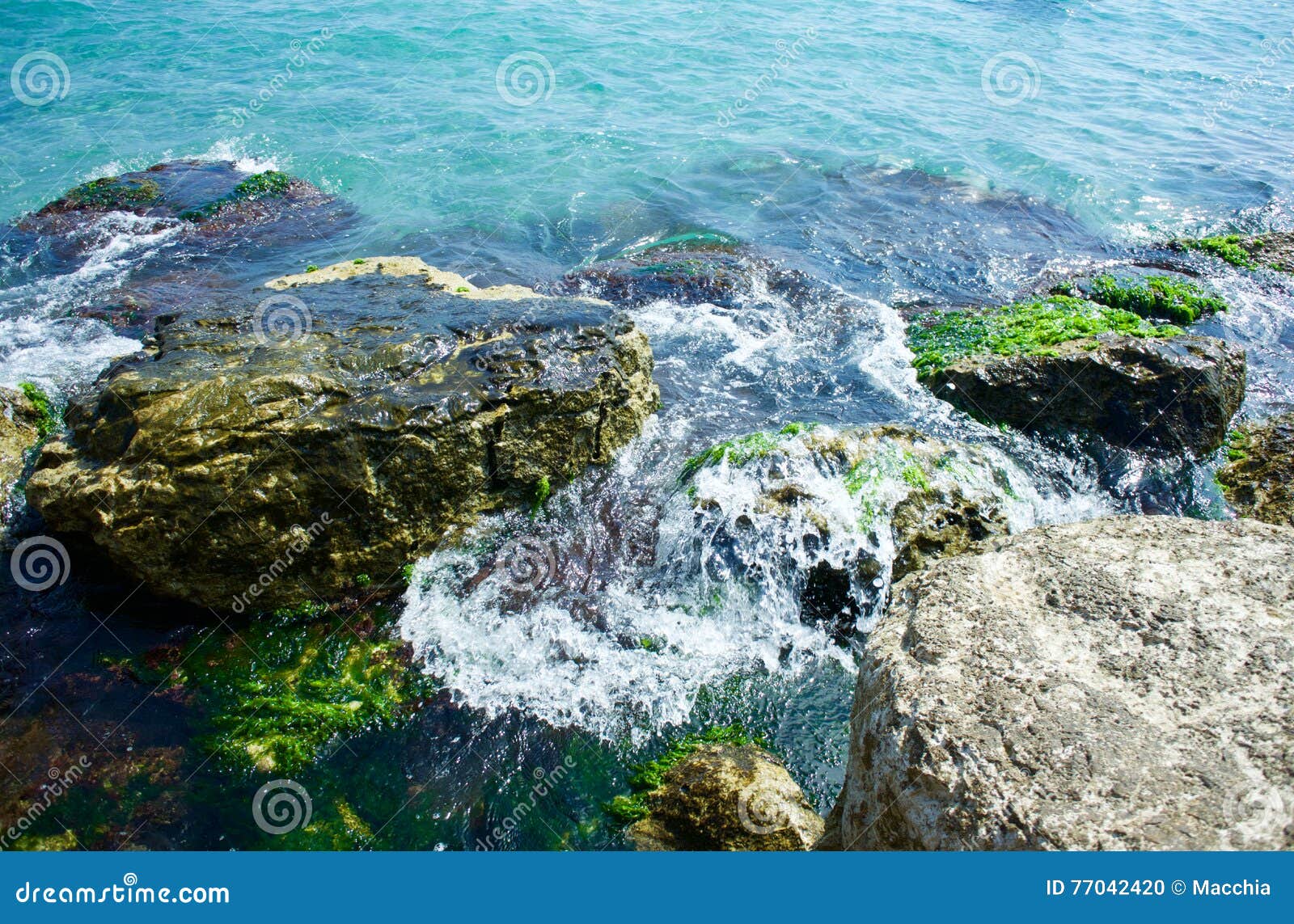 Waves on the rocks stock photo. Image of ocean, beach - 77042420