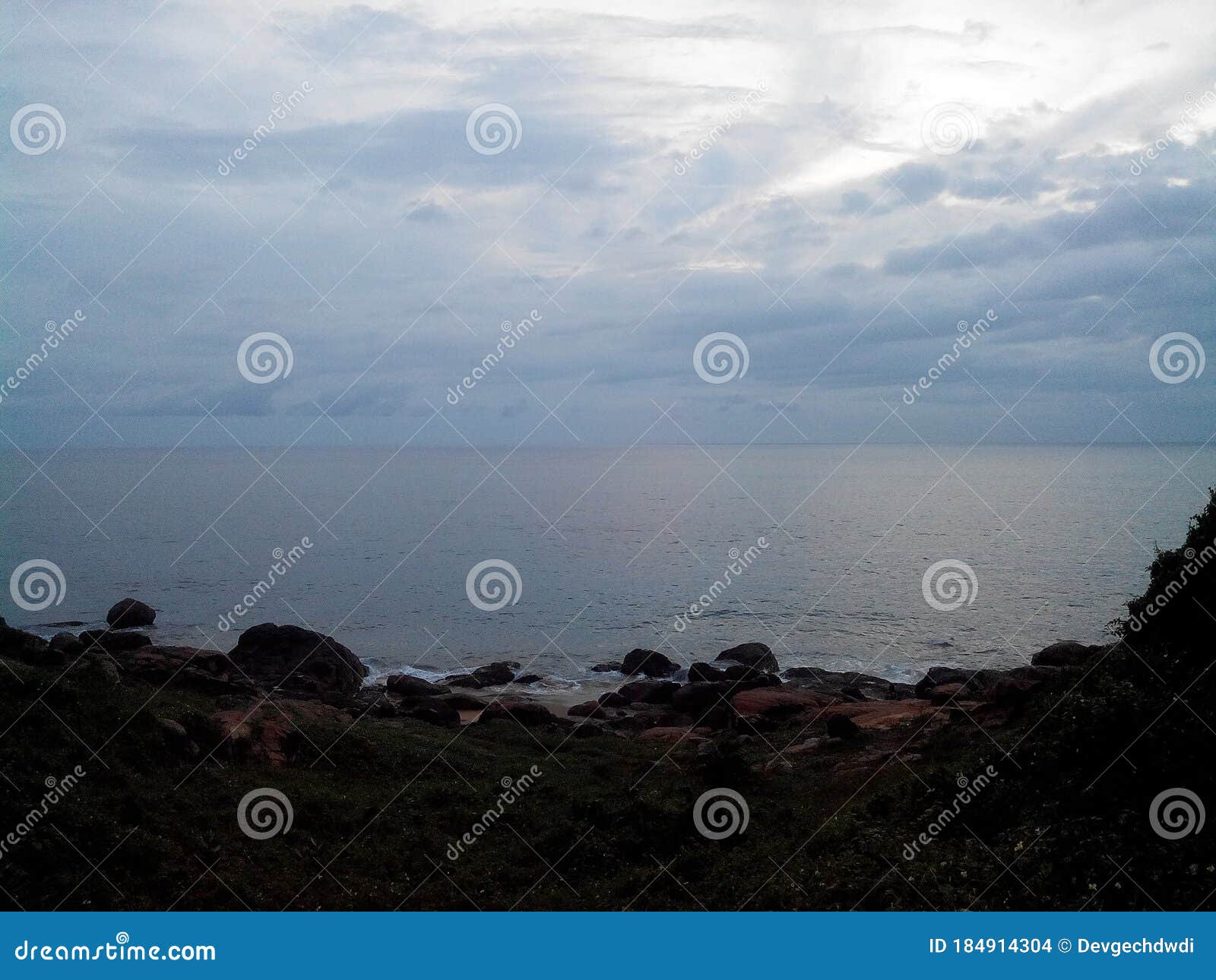 Waves on a rocky shore stock photo. Image of natireal - 184914304