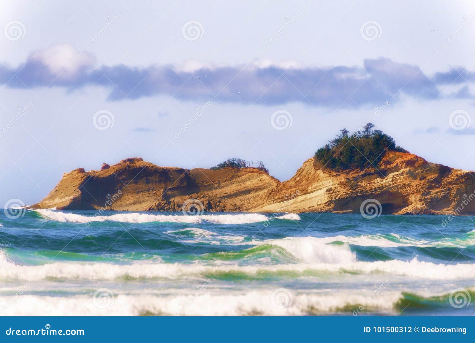 Sandstone Hills Jut Out into the Ocean Stock Photo - Image of ...