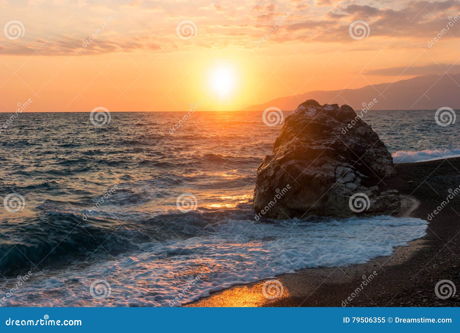 Waves Rolled at Sea Coast Line with Huge Rock at Sunset Stock Image ...