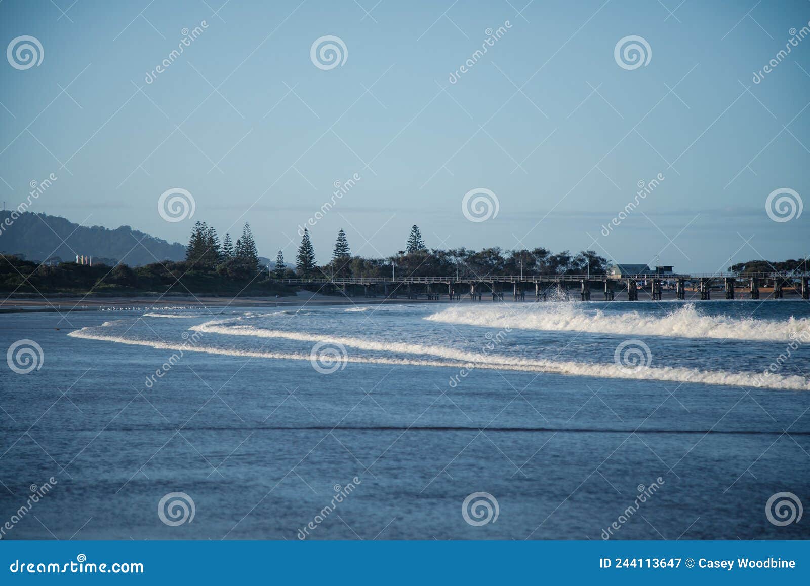 Waves Rolling in on Coffs Harbour Beach with Jetty in the Distance ...