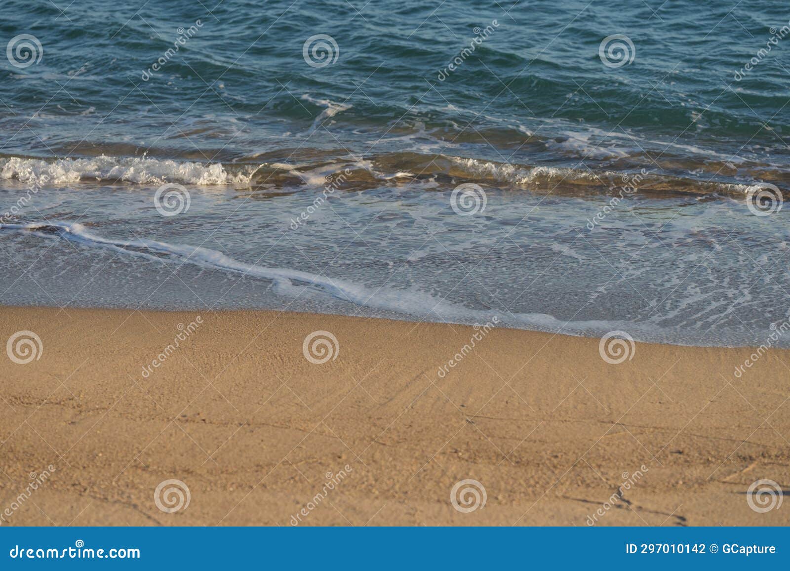 Waves Rolling on a Sandy Beach on a Sunny Day Stock Photo - Image of ...