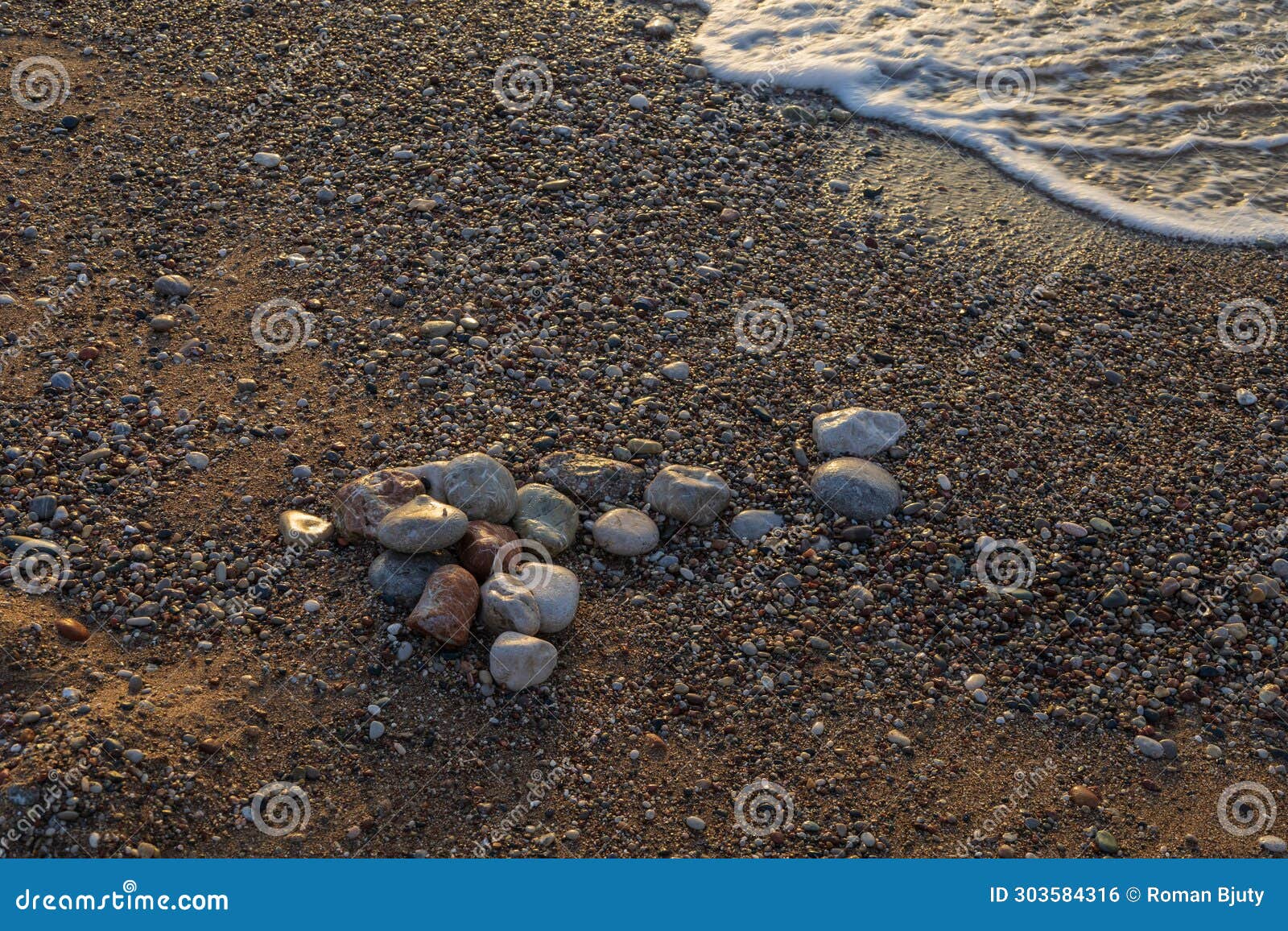 The Waves of the Sea Wash the Shore of the Pebble Beach Stock Photo ...