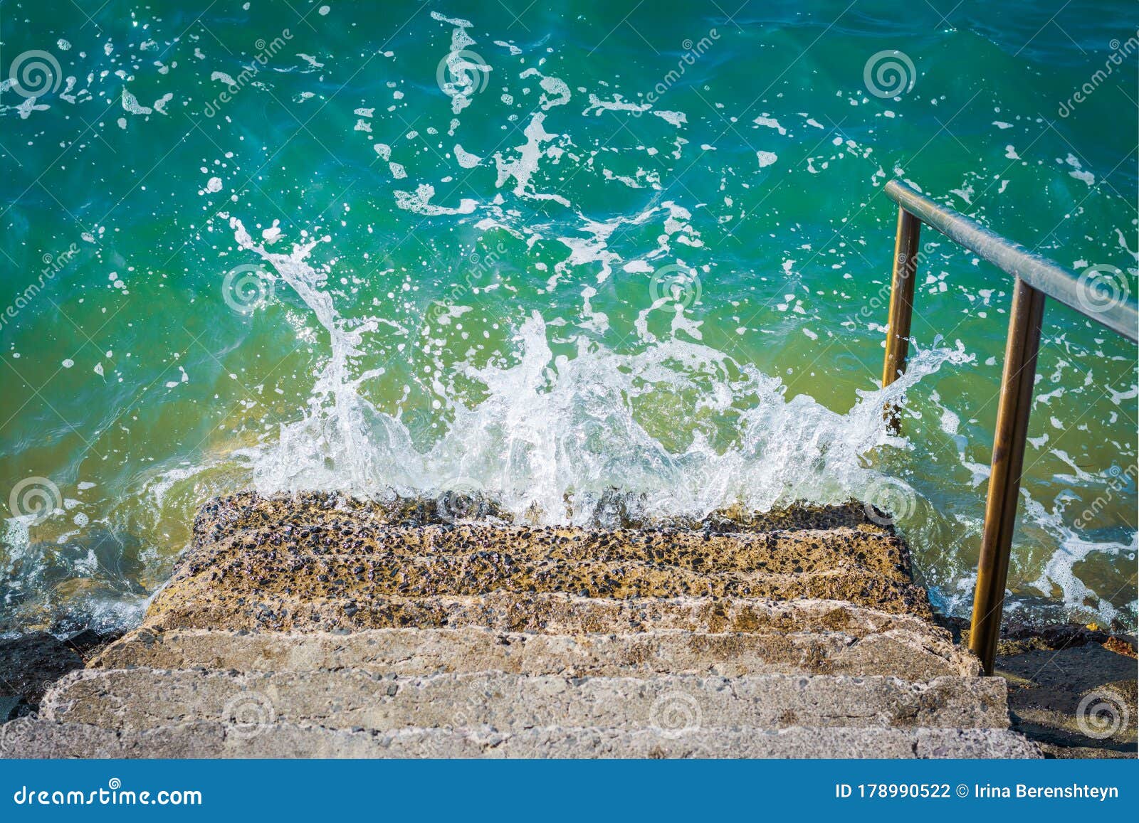 Waves Splash Against Concrete Steps Causing Foam Stock Photo - Image of ...