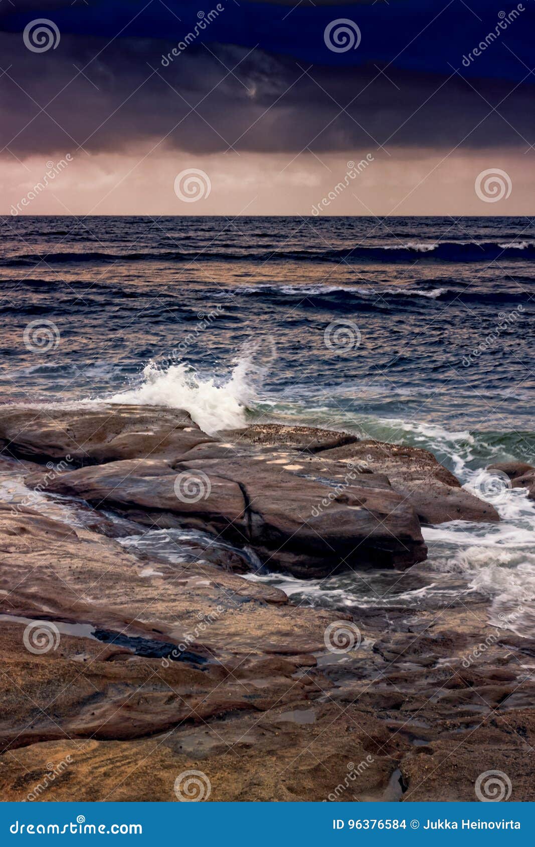 Waves Splash on the Rocks at Sunset Stock Photo - Image of sunset ...