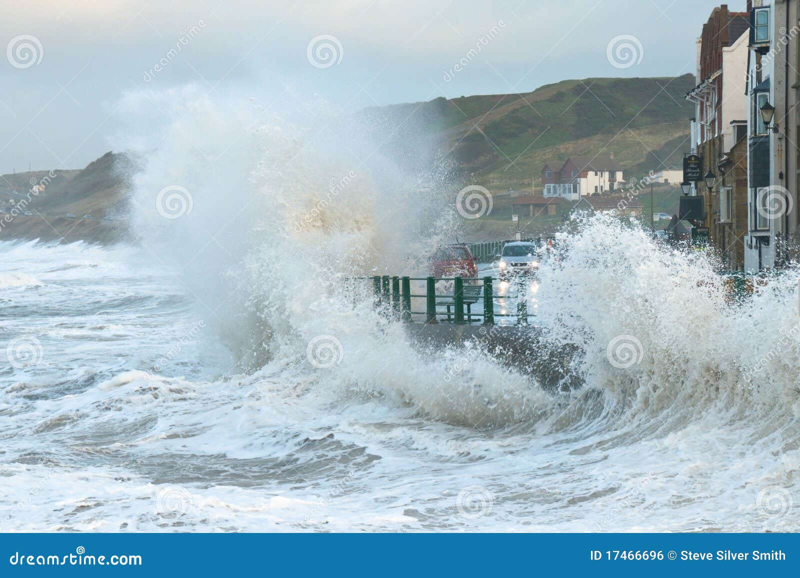 Waves Splashing Over Coast Road Stock Photo - Image of storm, yorkshire ...