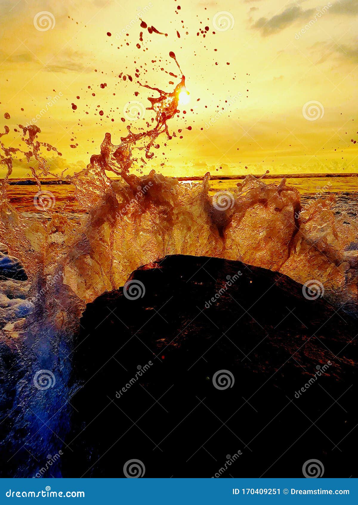 Waves splashing on a rock stock image. Image of splashing - 170409251