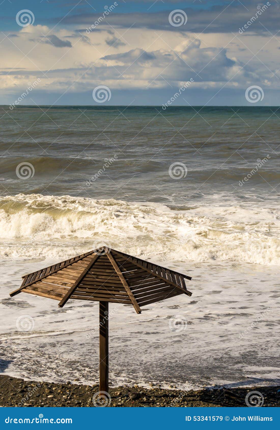 Waves and Sun Parasol stock image. Image of sunrays, shade - 53341579