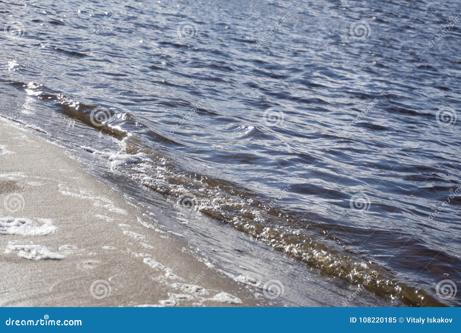 Waves Wash Over Dark Sand on the Beach . Stock Image - Image of waves ...