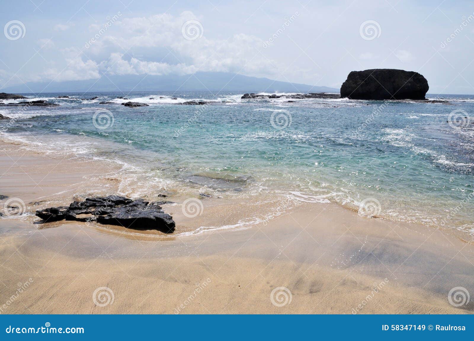 Waves Wash Over a Flat Rock on a White Sand Beach Stock Image - Image ...