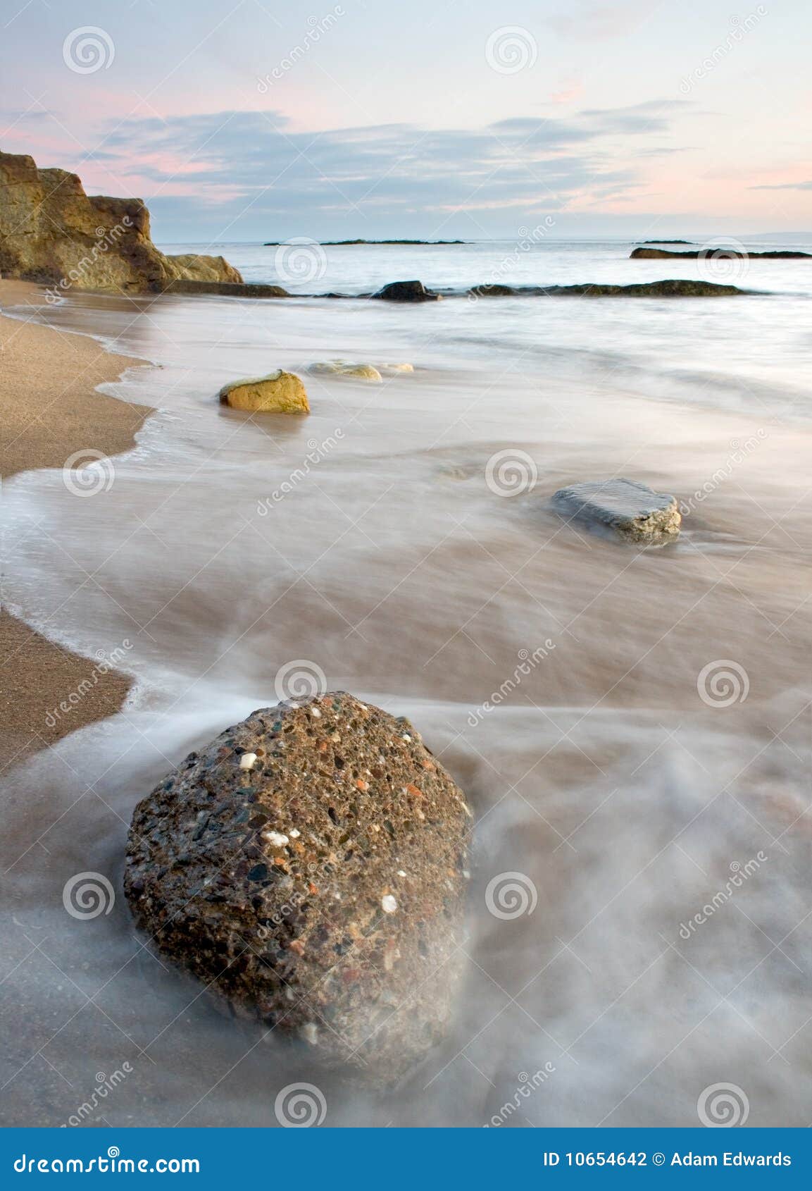 Waves Washing Over Some Coastal Rocks Stock Photo - Image of colourful ...