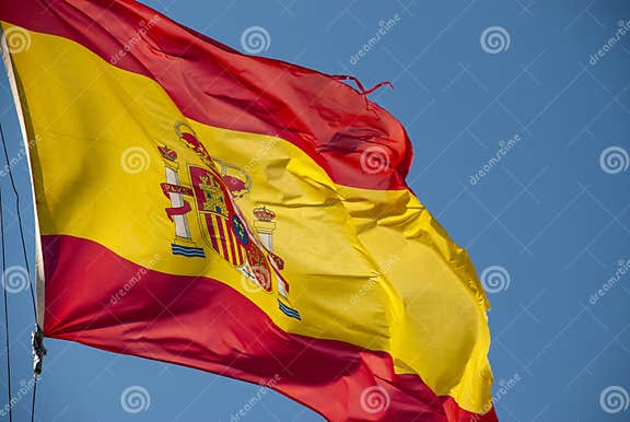 Flag of Spain on a pole stock photo. Image of nation - 135930622