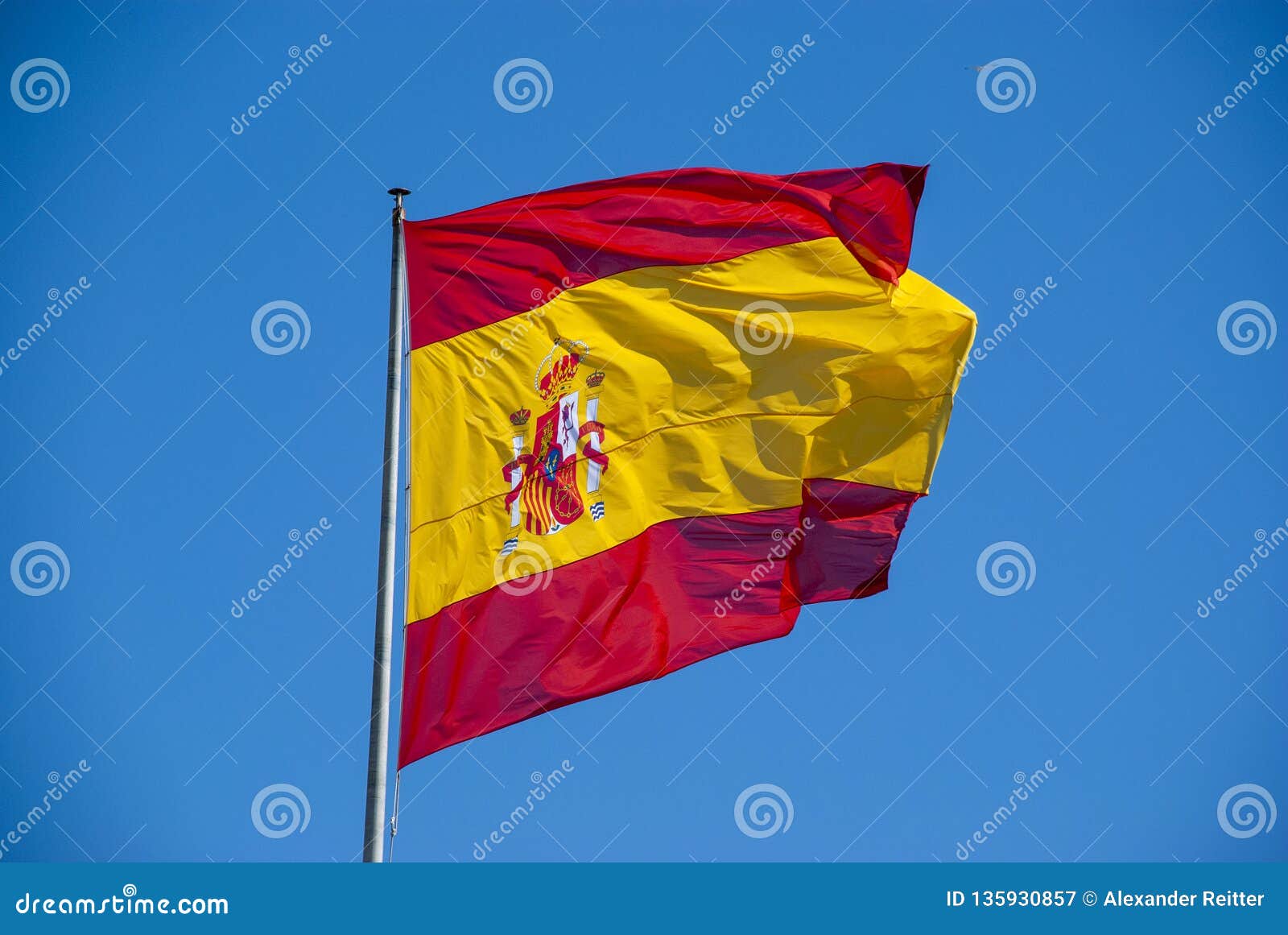 Flag of Spain on a pole stock image. Image of waving - 135930857