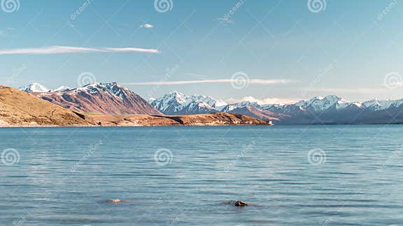 Wavy Lake Surrounded by Mountains Stock Image - Image of lake, travel ...