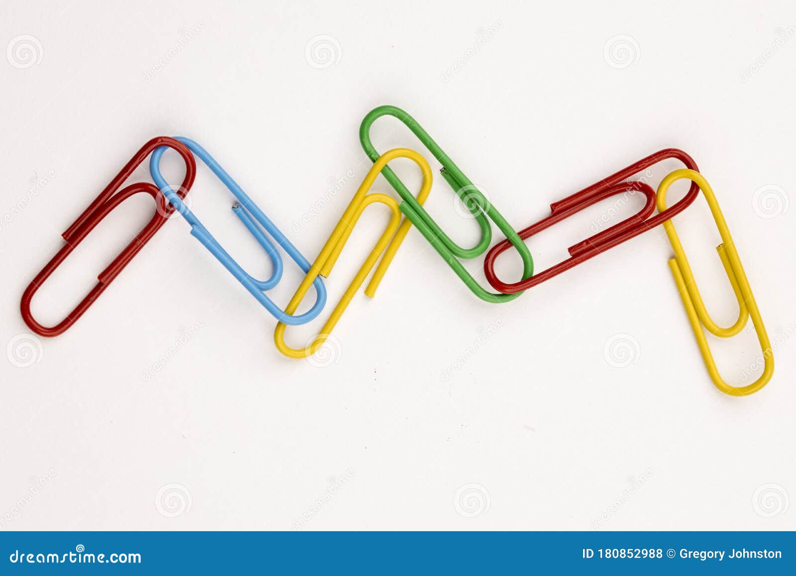Wavy link of paper clips stock photo. Image of green - 180852988