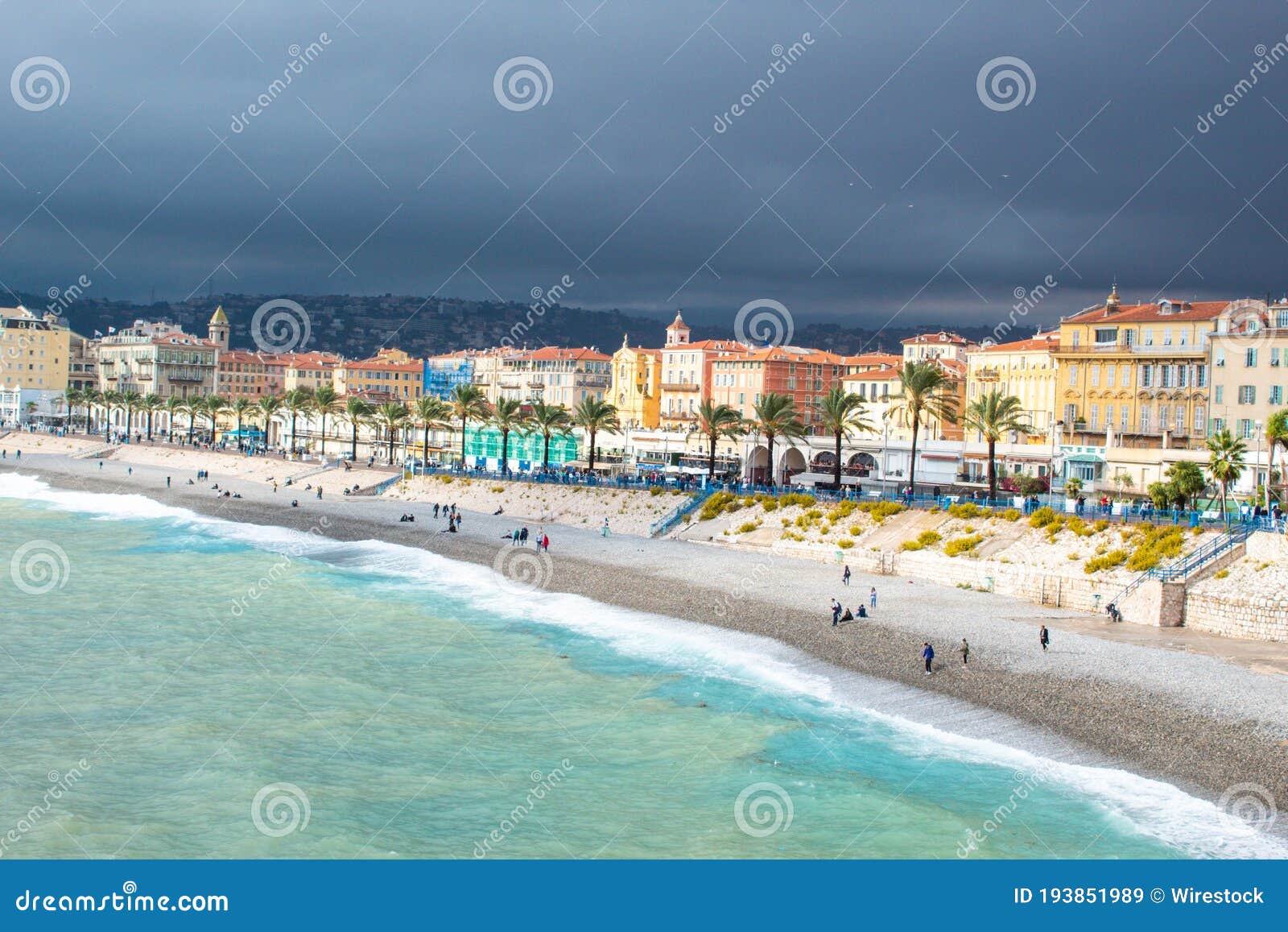 Wavy Ocean Hitting the Sandy Beach in Nice, France Editorial Stock ...