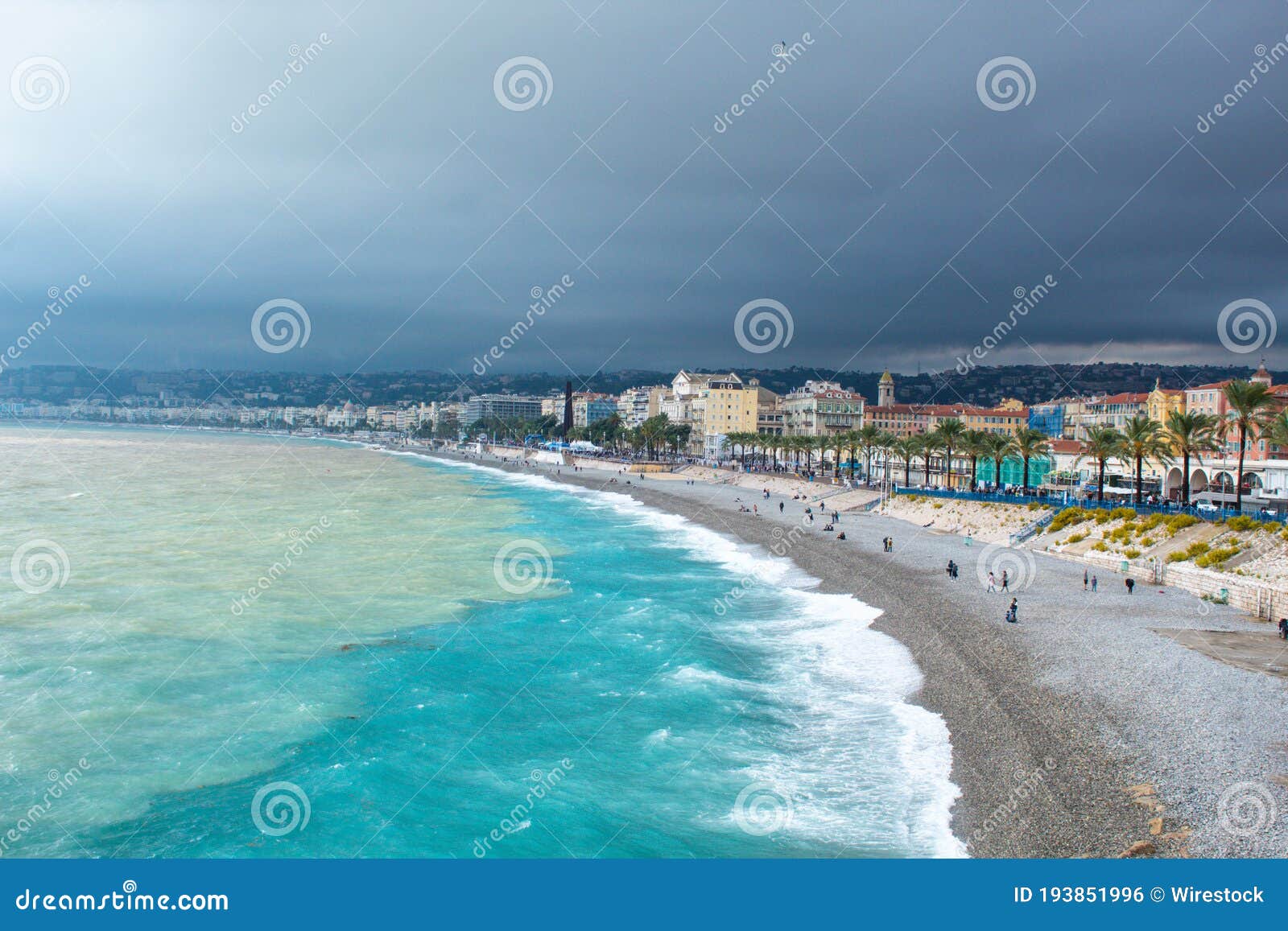 Wavy Ocean Hitting the Sandy Beach in Nice, France Stock Photo - Image ...