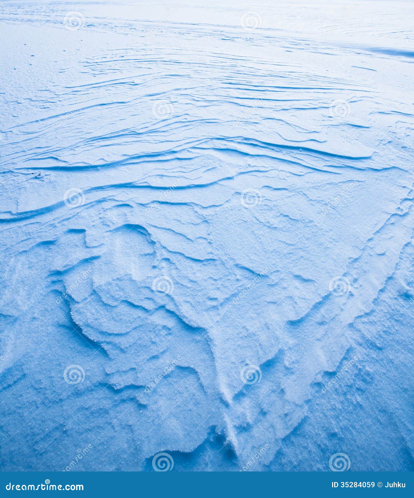 Wavy wind patterns in snow stock image. Image of season - 35284059