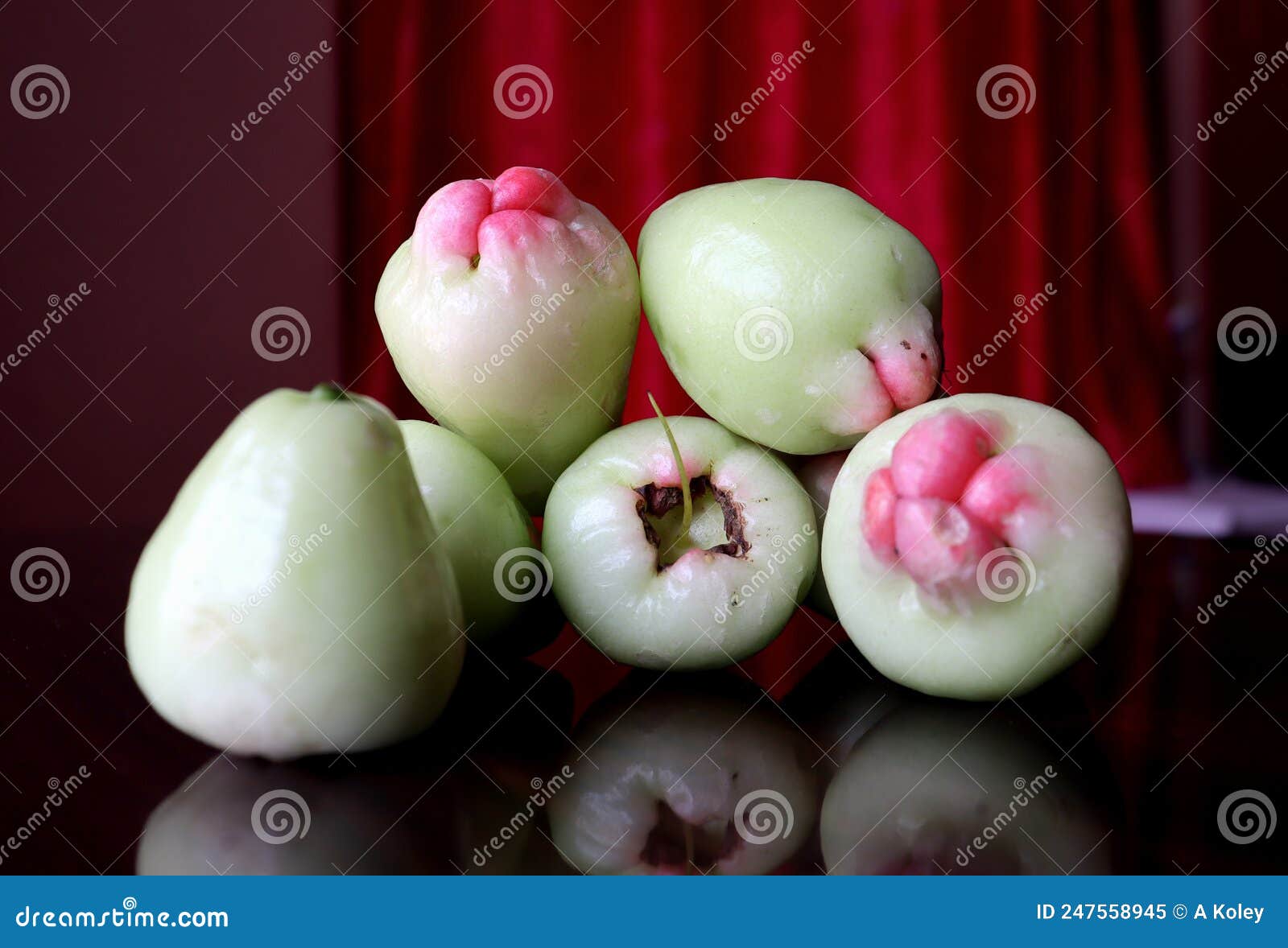 Wax Apples,White and Red Jamrulon a Reflective Surface Stock Image ...
