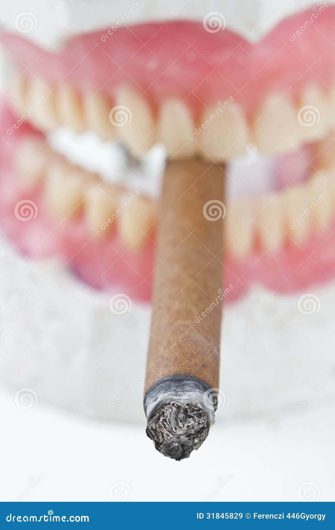 Wax denture with cigarette stock image. Image of medical - 31845829