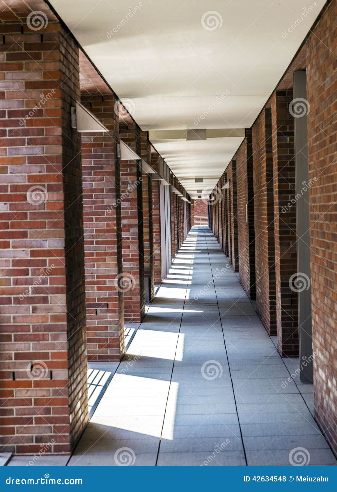 Way between Brick Wall Columns Stock Photo - Image of summer, warehouse ...