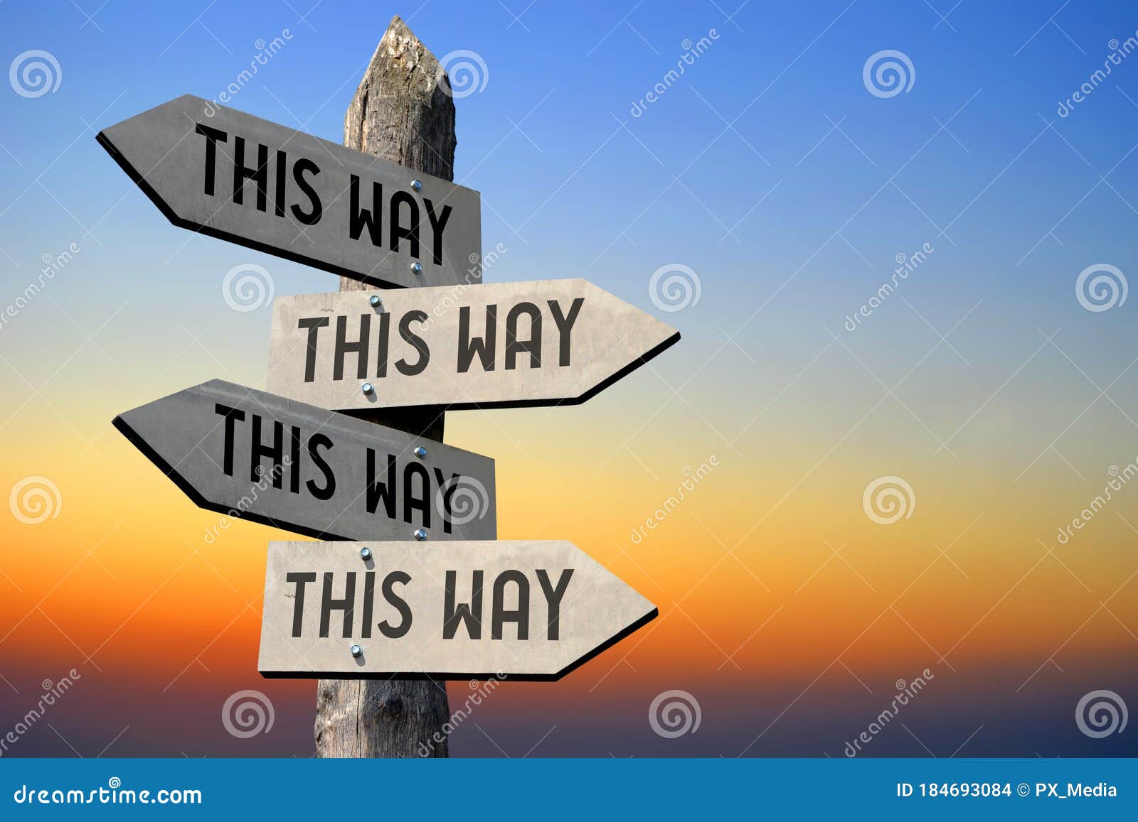 This Way - Wooden Signpost, Sunset Sky Stock Photo - Image of pole ...