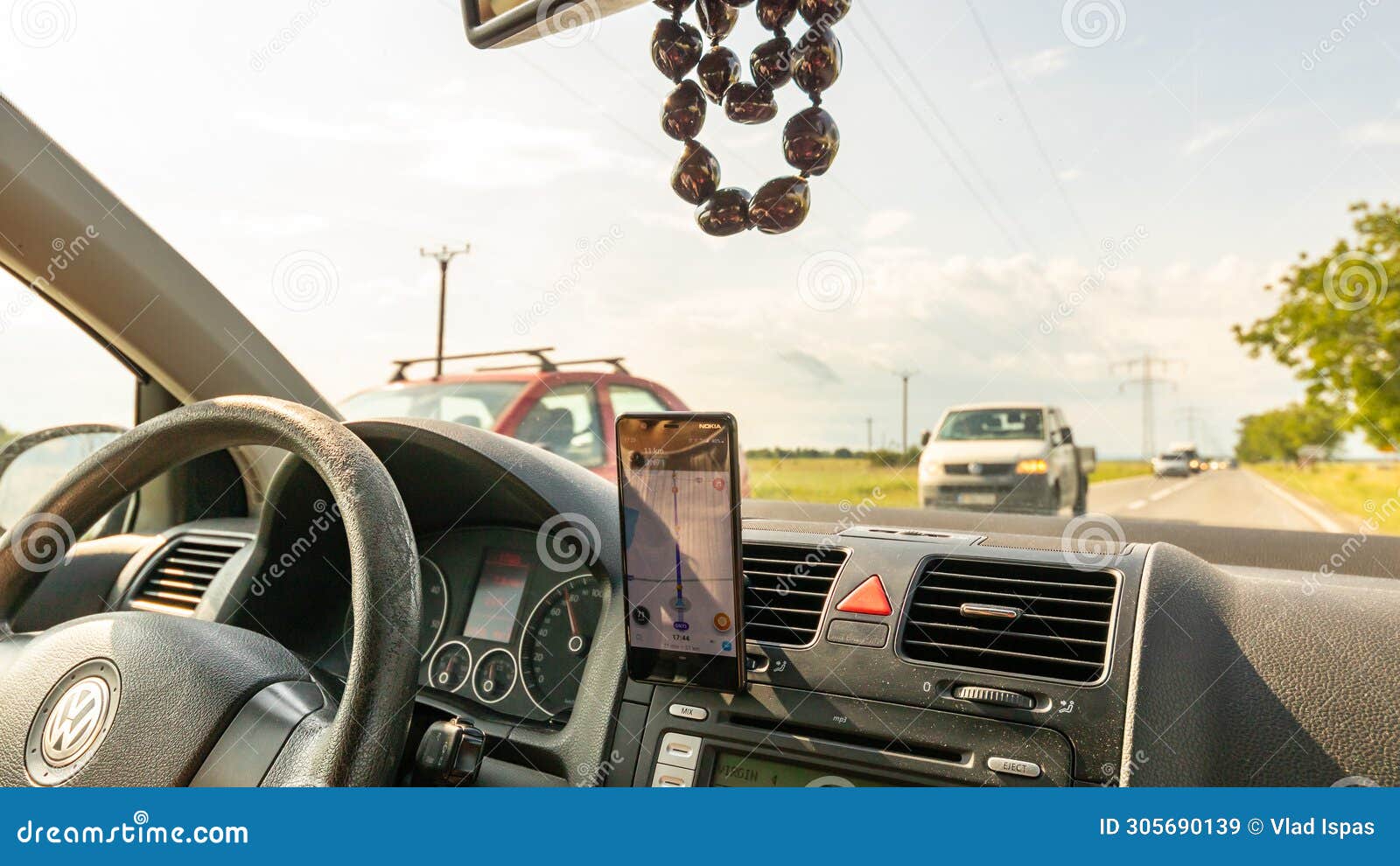 Waze Maps Showing the Way Thru the City. Driver Using Waze Maps ...