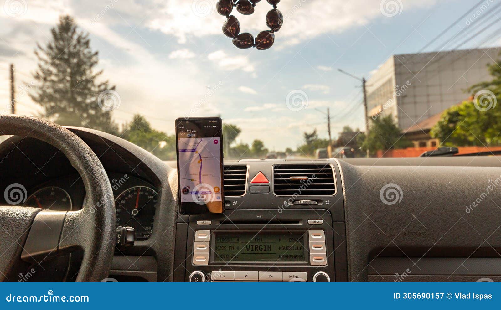 Waze Maps Showing the Way Thru the City. Driver Using Waze Maps ...
