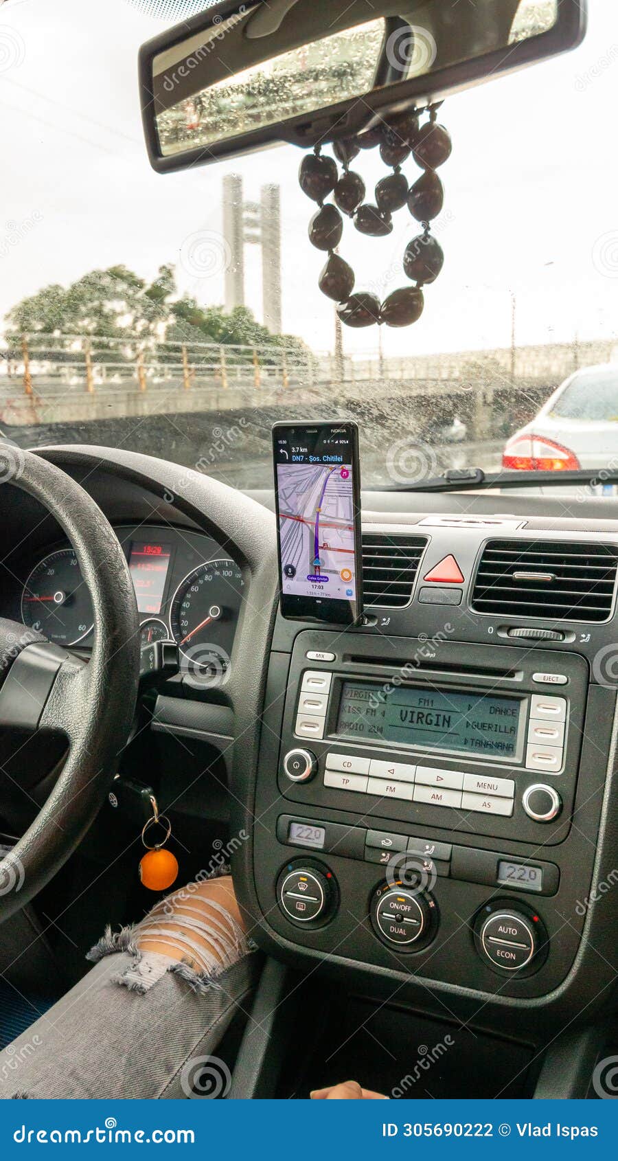 Waze Maps Showing the Way Thru the City. Driver Using Waze Maps ...
