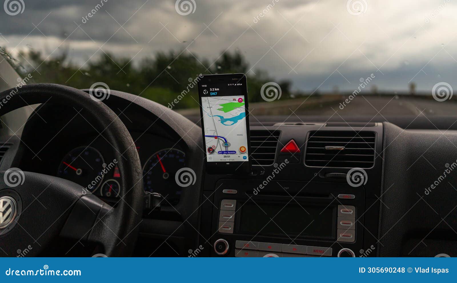 Waze Maps Showing the Way Thru the City. Driver Using Waze Maps ...