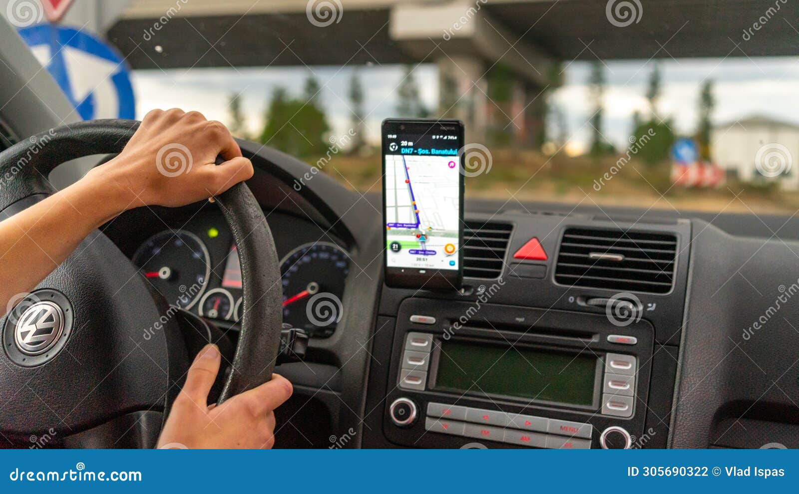 Waze Maps Showing the Way Thru the City. Driver Using Waze Maps ...