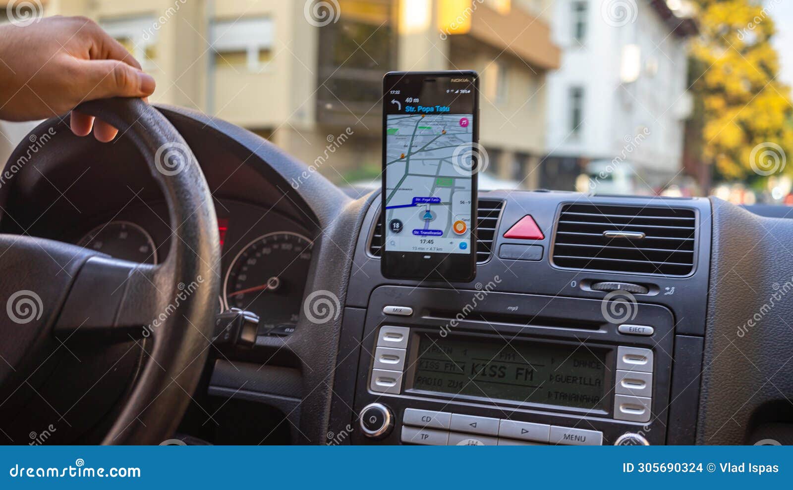 Waze Maps Showing the Way Thru the City. Driver Using Waze Maps ...