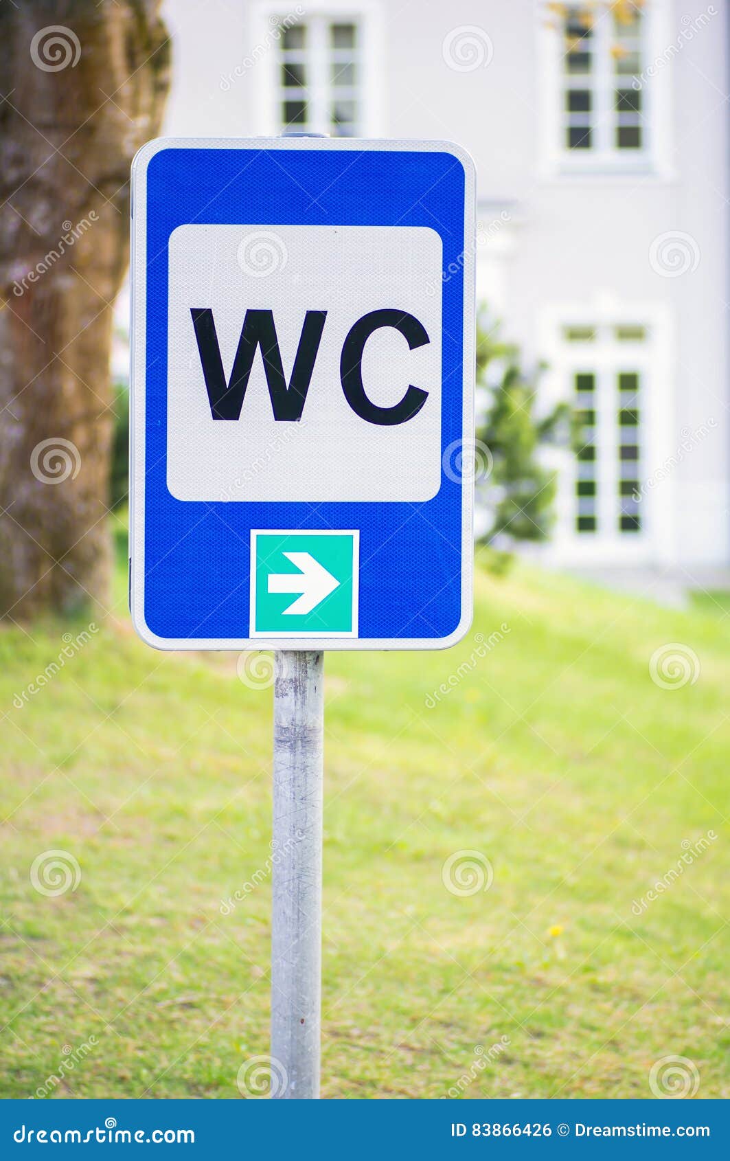 WC or Toilet Sign with White House Stock Photo - Image of space, arrow ...